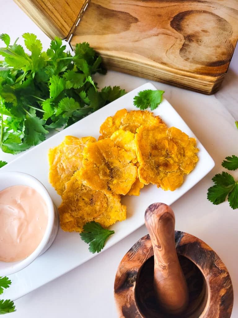 Garlic Tostones (Fried Garlic Plantains) - Mexican Appetizers and More!